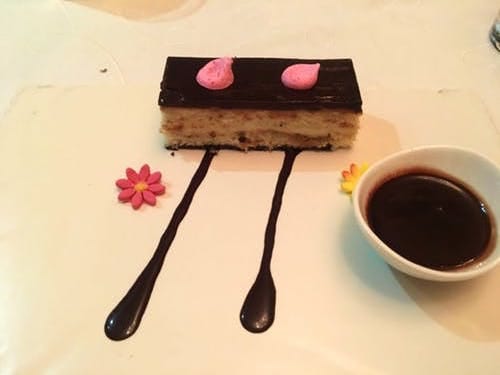 Relish Spanish Vanilla Gateaux Cake With Hot Chocolate Sauce At Sevilla ...